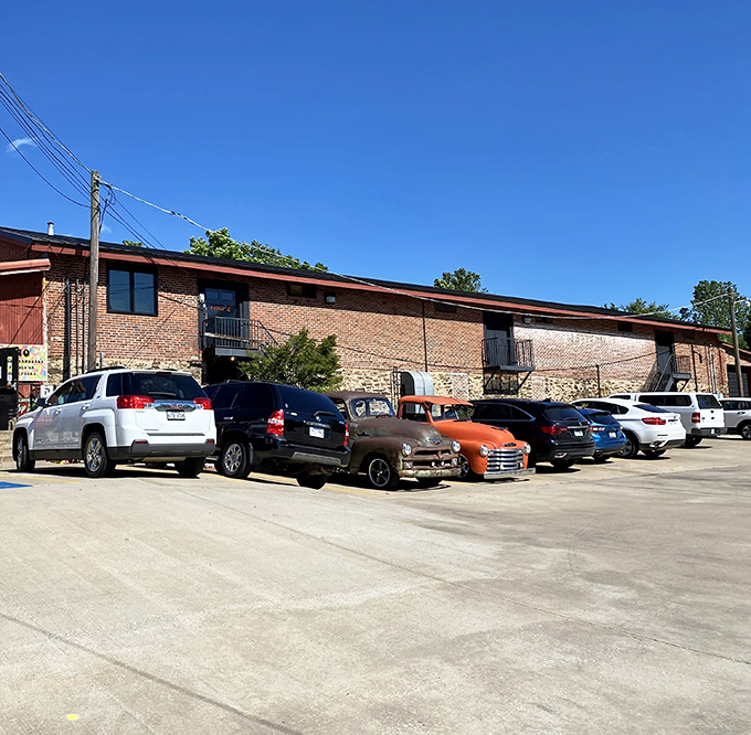 Even the parking lot tells stories, with vintage trucks mingling among modern SUVs like a four-wheeled family reunion.