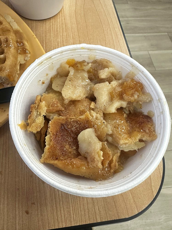 Peach cobbler that tastes like summer memories, with a perfect balance of fruit and buttery crust that makes sharing seem like a terrible idea.