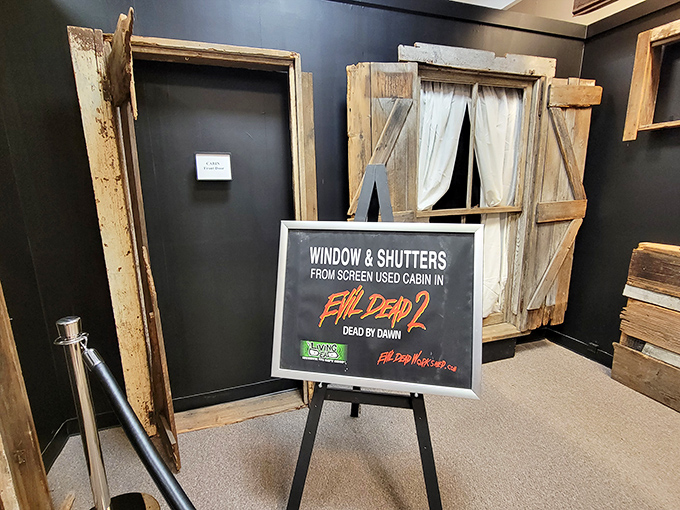 These weathered shutters from "Evil Dead 2" once failed to keep evil at bay. Now they're preserved as artifacts from one of horror's most beloved sequels.