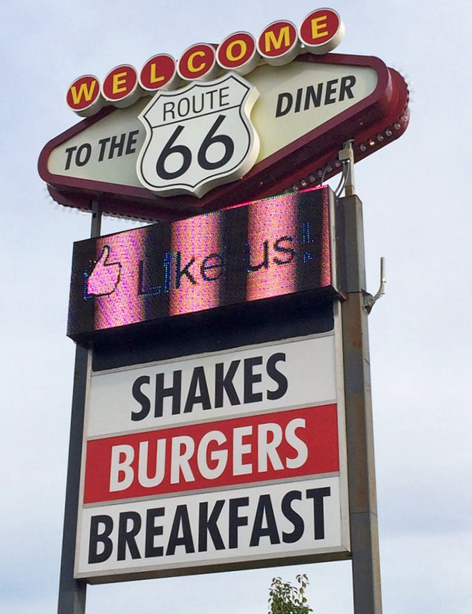 The beacon that calls to hungry travelers. This sign doesn't just advertise food—it promises an experience worth pulling over for.