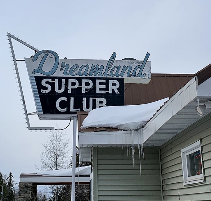 Winter can't stop the Dreamland magic. That snow-covered sign is practically a Wisconsin heritage site, promising warmth and lobster inside.