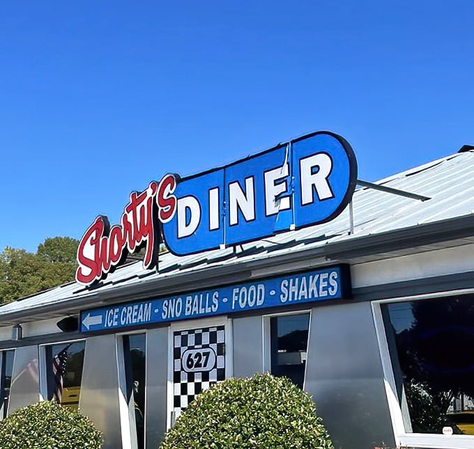 That sign isn't just announcing a restaurant&mdash;it's promising ice cream, sno balls, shakes, and the kind of day that makes you forget your troubles.