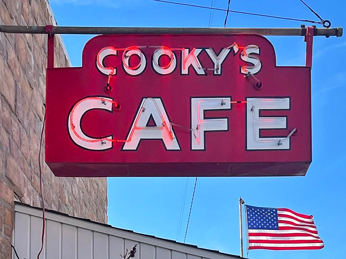 Against blue Missouri skies, the Cooky's sign has guided hungry travelers for generations&mdash;a red beacon of culinary comfort.