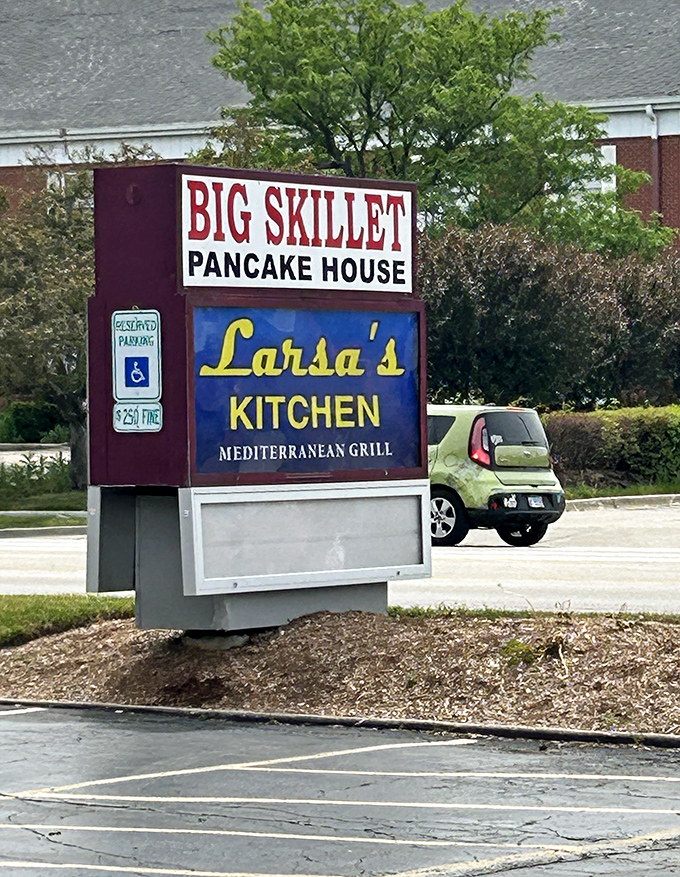 The sign stands tall and proud, like a breakfast lighthouse guiding hungry souls to pancake salvation.