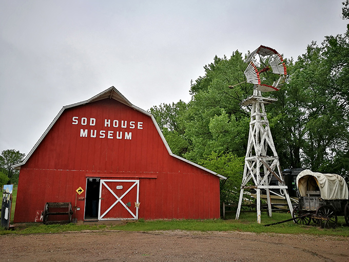 The Sod House Museum's red barn and windmill capture pioneer spirit in the most photogenic way possible.