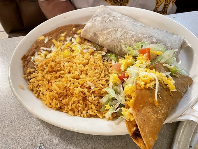 The classic combo plate&mdash;where a taco and burrito live together in perfect harmony alongside Spanish rice and refried beans.