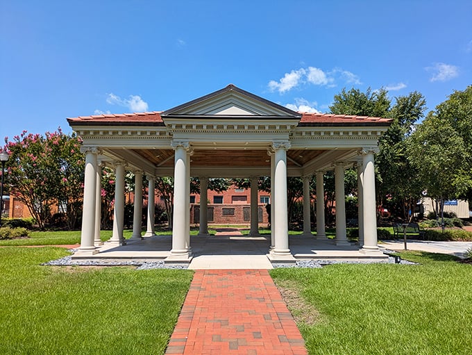The Veterans Memorial pavilion provides a dignified space for reflection and remembrance, its classical design and meticulous landscaping creating a peaceful retreat in the heart of town.