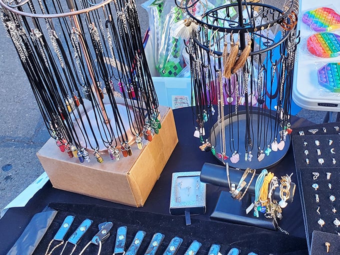 Jewelry displays create a miniature cityscape of pendants and charms. Each necklace tells a different story, waiting for the right person to continue it.
