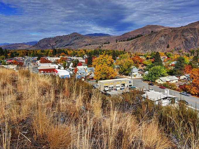 Autumn paints Twisp in impossible colors, transforming this mountain town into a patchwork quilt of reds, golds, and the last green whispers of summer.