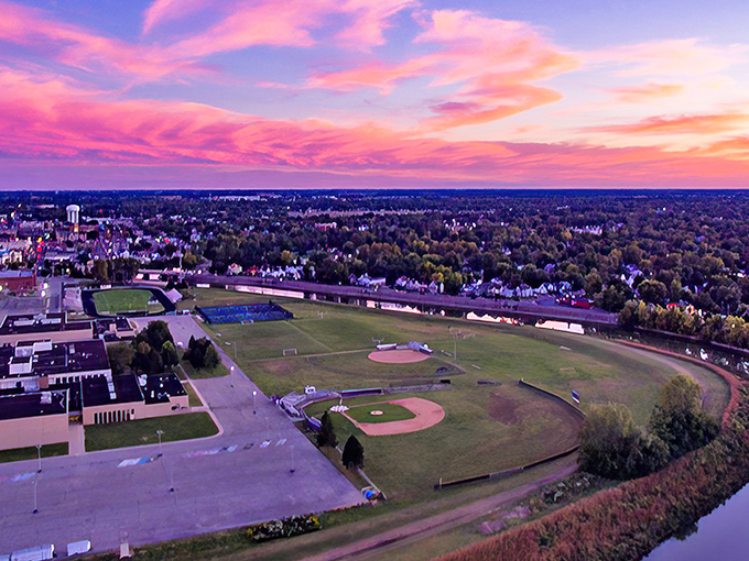 As twilight bathes Muncie in cotton candy hues, the sprawling landscape reveals a community where stretching your retirement dollars doesn't mean shrinking your horizons.