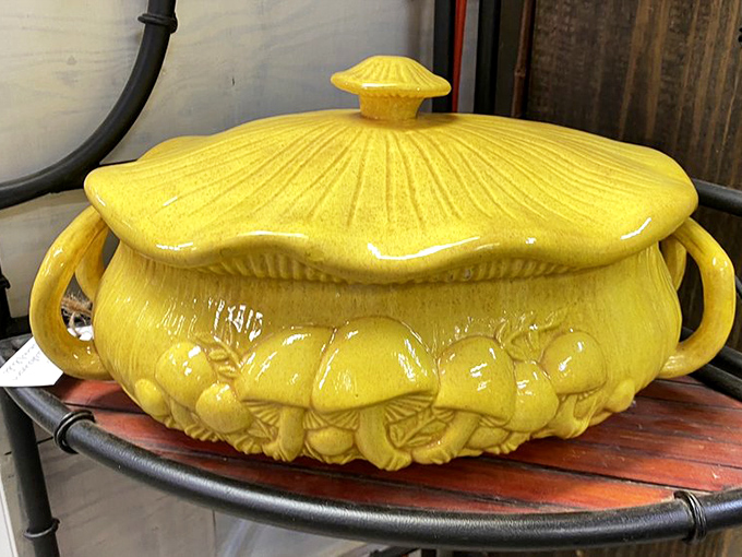 Sunshine captured in ceramic form! This yellow casserole dish has likely witnessed more family recipes than a church cookbook committee.
