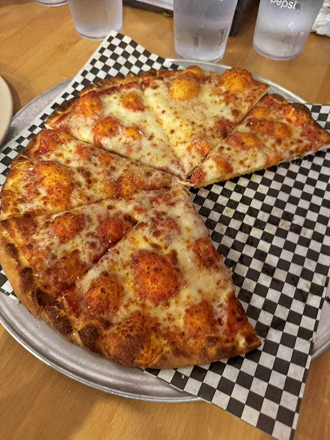 Sometimes simplicity speaks volumes&mdash;this cheese pizza whispers sweet nothings of perfectly melted mozzarella atop a hand-crafted crust.