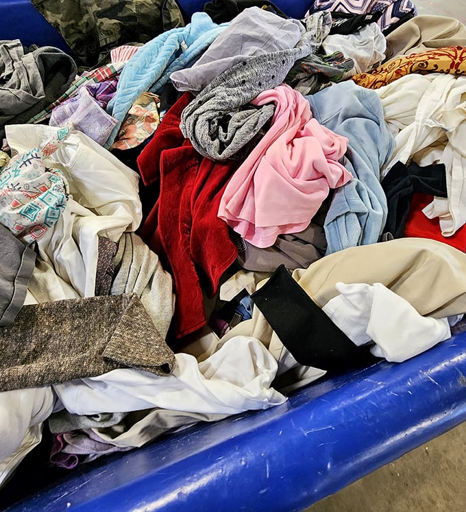 Textile treasure hunting at its finest. Somewhere in this colorful fabric sea swims the perfect sweater, just waiting to be discovered.