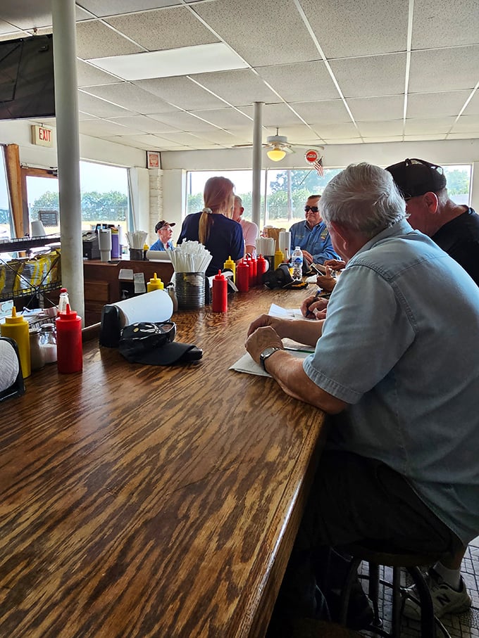 Inside seating where strangers become friends united by the common bond of affordable, delicious hot dogs done right.
