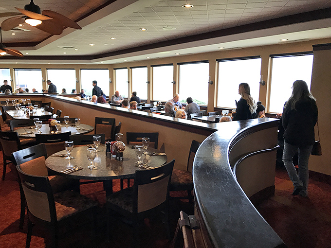 The curved dining area ensures everyone gets their moment with the Pacific. Some restaurants understand that views should be democratized.