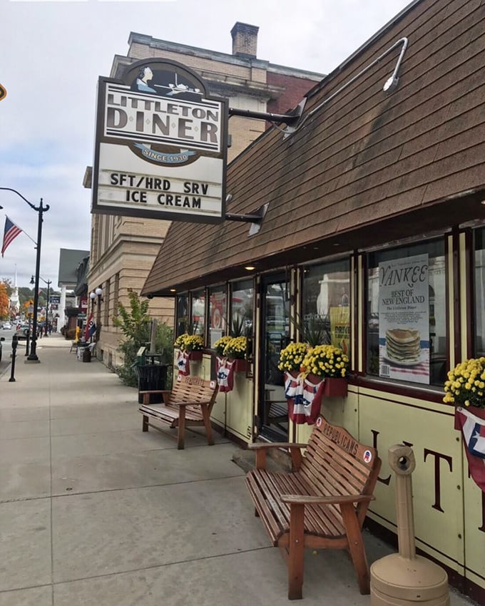 The charming exterior welcomes Main Street visitors with benches and patriotic decor, inviting you to discover what locals have known for decades.
