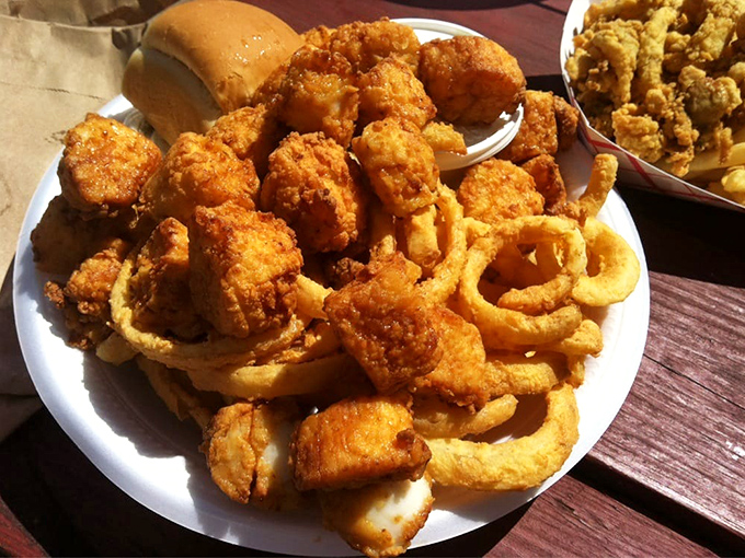 A platter that screams "New England summer"&mdash;fried scallops, onion rings, and a roll on standby. This isn't just food; it's a regional handshake.