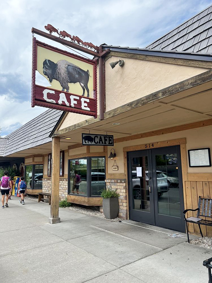 The cafe's entrance promises breakfast nirvana at 514 East Second Street. That swinging buffalo sign has guided hungry pilgrims for decades of Whitefish mornings.