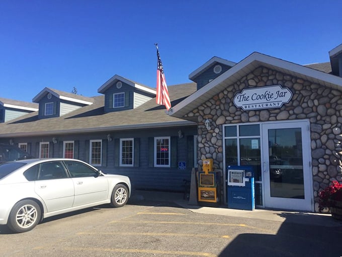 The American flag stands proud beside The Cookie Jar's stone entrance. This isn't just a restaurant&mdash;it's a Fairbanks institution where Alaska shows its hospitable heart.