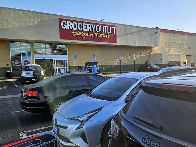 Even the parking lot tells a story: luxury cars next to practical sedans, united by the universal language of savings.