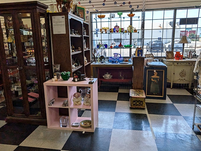 The checkerboard floor leads you through displays curated with the care of a museum but priced for people who actually want to take history home.