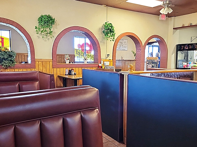The dining room's arched windows and comfortable booths create the perfect setting for solving the world's problems over endless cups of coffee.