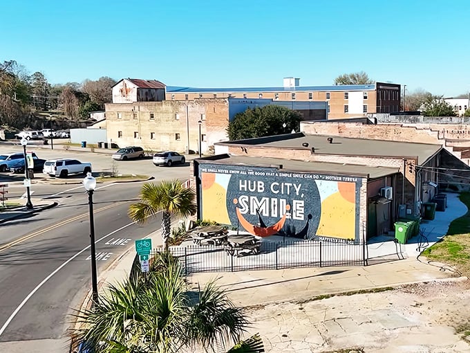 Murals that speak to the soul of a place. This "Hub City Smile" artwork captures Hattiesburg's spirit&mdash;welcoming, bright, and just quirky enough to be interesting.