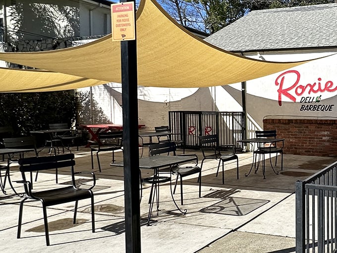 The outdoor seating area isn't fancy, but it's perfect for that moment when you need to sit down and have a serious conversation with your sandwich.