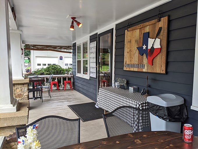 The front porch&mdash;where checkered tablecloths and Texas pride create the perfect setting for post-barbecue contemplation and meat sweats recovery.