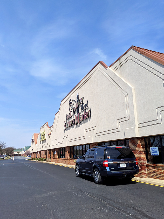 The market's distinctive silhouette against blue skies serves as a beacon for food lovers, like a lighthouse guiding hungry ships to shore.