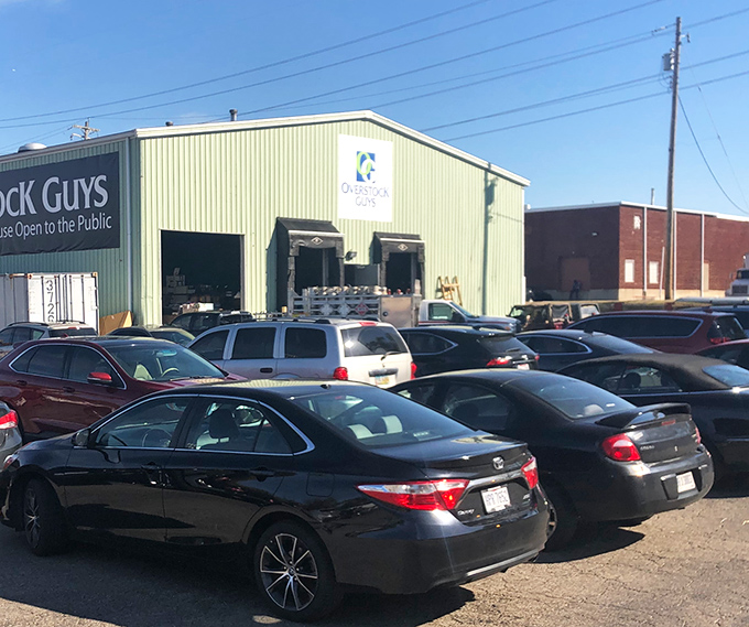 Packed parking lot: the universal sign of "get in there before all the good stuff is gone!" Bargain hunters know where to flock.