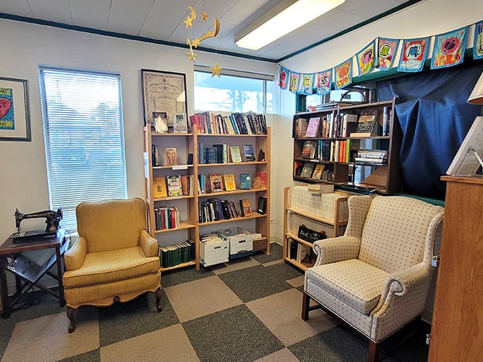 The reading room's mismatched armchairs and checkered floor create a cozy sanctuary where you can test-drive a potential literary companion before commitment.