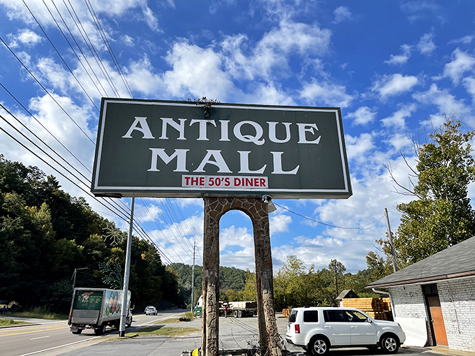 The roadside beacon that calls to vintage lovers and curious travelers alike. "The 50's Diner" addition promises sustenance for your antiquing marathon.