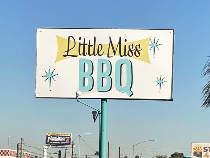 A sign that beckons like a lighthouse to hungry sailors. Follow it to find your BBQ salvation in the Arizona desert.