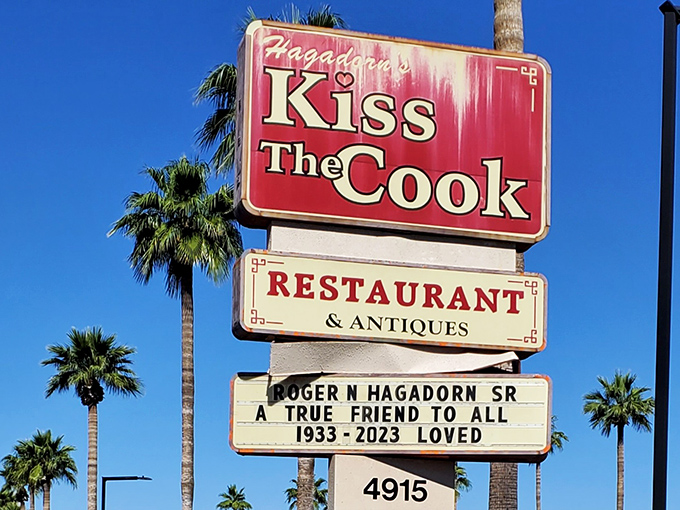 The sign that's guided hungry travelers for years, standing tall against the Arizona sky like a beacon of breakfast hope among the palm trees.