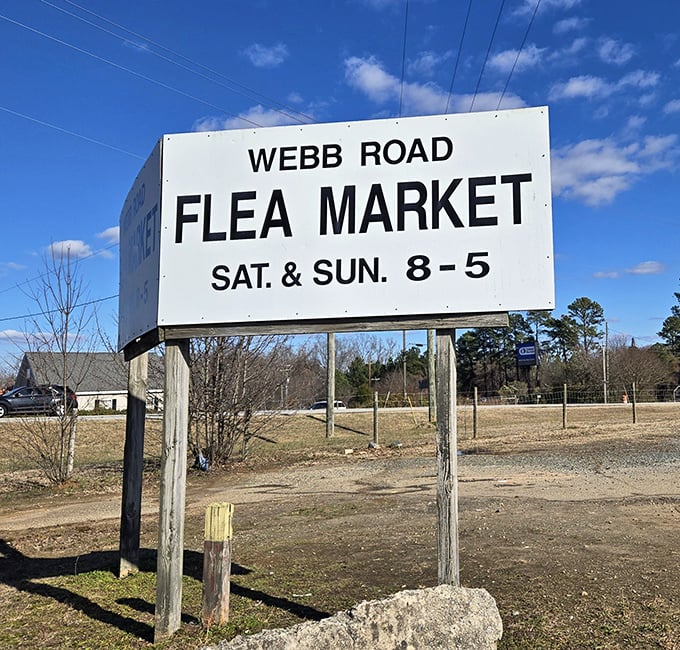 The beacon that draws bargain hunters from miles around. This simple sign promises weekend adventures that turn thirty dollars into memories.