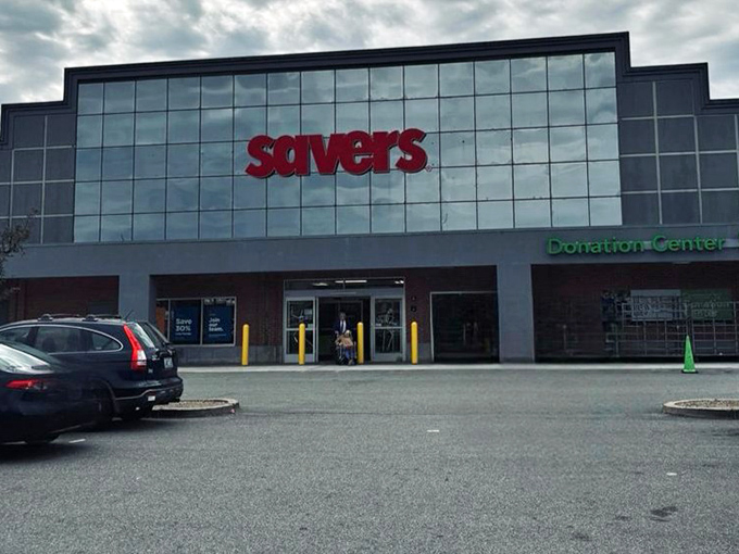 The glass facade gleams with promise under moody skies, like the retail equivalent of "it's what's inside that counts."
