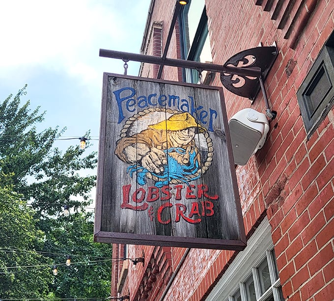 A sign that promises exactly what awaits inside: seafood worth traveling for. The wooden crab seems to wink, knowing what delights you'll discover.