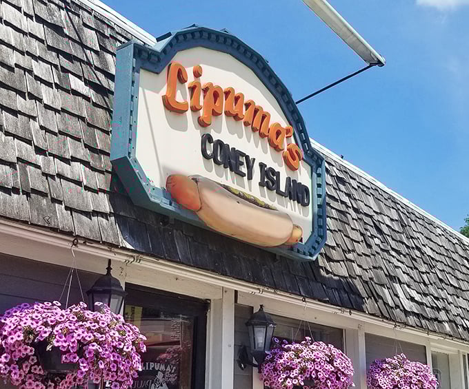 The iconic sign promises exactly what awaits inside &ndash; unpretentious perfection on a bun, served with a side of Rochester history.