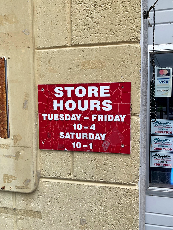 Store hours posted with no-nonsense clarity. The thrill of the hunt has a schedule, and serious treasure seekers plan accordingly.