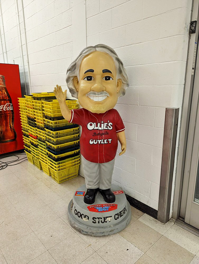 Meet the unofficial greeter of bargain paradise. This cheerful mascot stands guard, silently promising "Good Stuff Cheap" to all who enter.