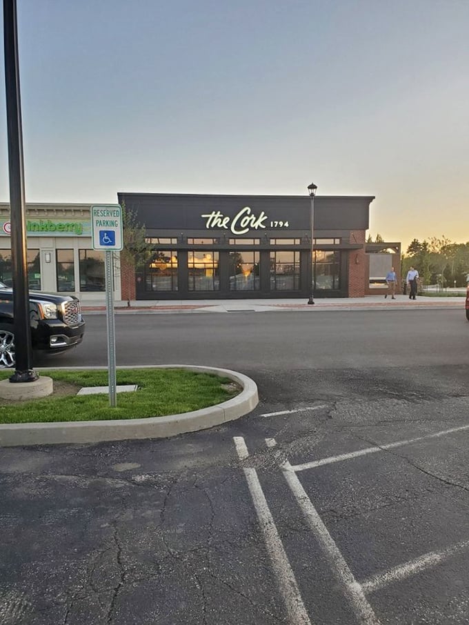 As the sun sets on The Cork 1794, you realize this unassuming building holds some seriously impressive culinary secrets inside.