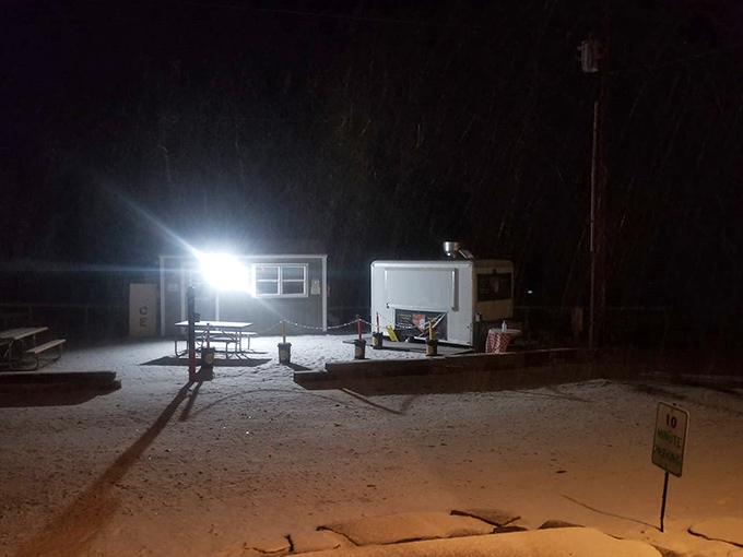 Even in darkness, the burger beacon shines. Some say the best meals happen when you least expect them, like finding this illuminated oasis at night.