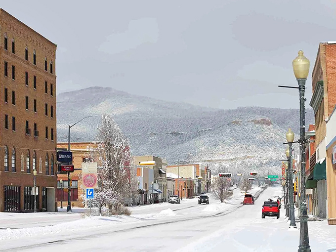 Winter transforms Raton's main street into a snow globe scene, where mountains powdered white create a backdrop worthy of a holiday movie.