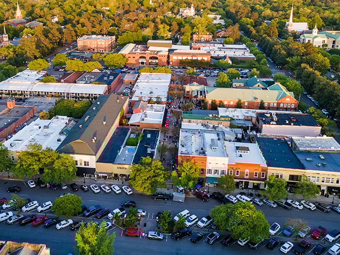 Aiken from above - a patchwork quilt of brick buildings, tree-lined streets, and Southern charm that unfolds like a storybook when viewed from the sky.