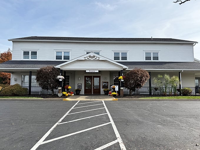 The Amish Door Restaurant stands proud in white, like a welcoming farmhouse where calories don't count and comfort is always on the menu.