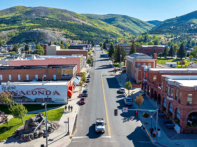 Anaconda's main street stretches toward mountain majesty – where copper mining history meets small-town charm in perfect harmony.