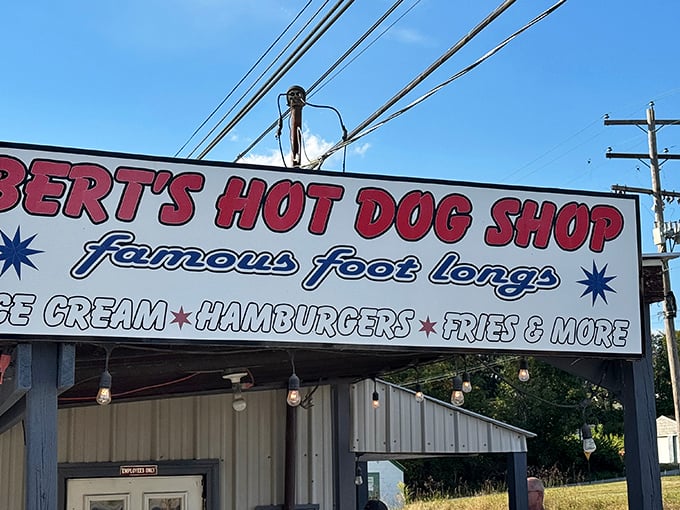 Bert's iconic sign promises "famous foot longs" &ndash; a roadside beacon of hope for hungry travelers with hot dog dreams.