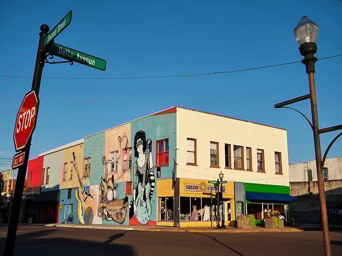 Colorful murals bring Clarksdale's Delta Avenue to life, where blues history and budget-friendly living harmonize at every corner.