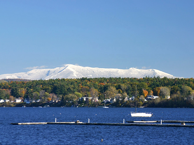 Snow-capped mountains rise majestically behind Colchester's shoreline, like nature showing off its best winter outfit.